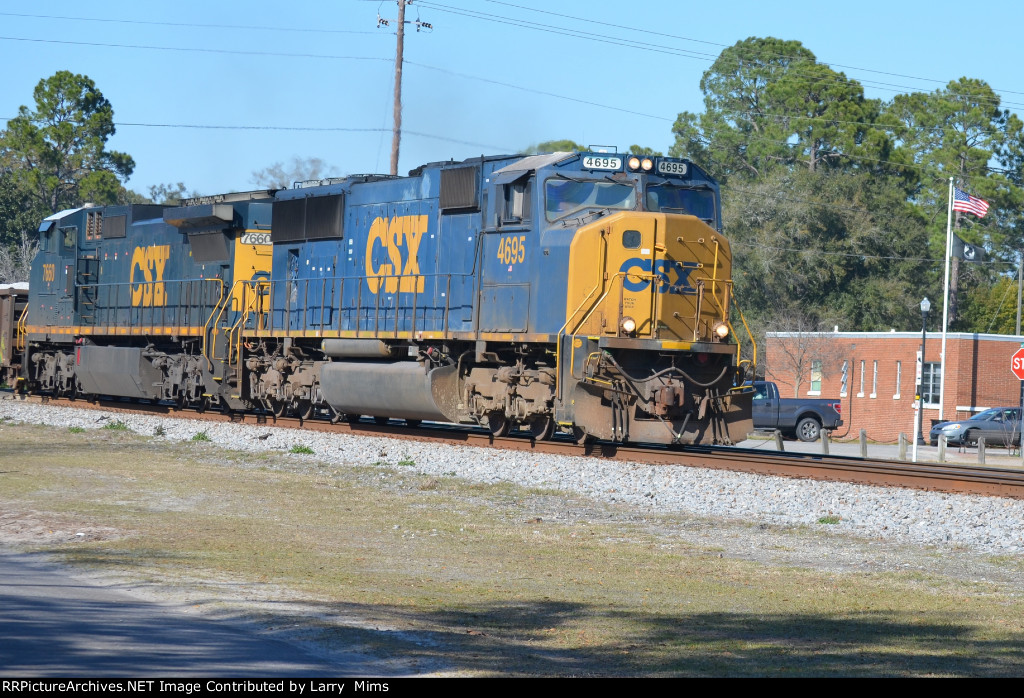 CSX 4695 and 7660 with loaded rock train