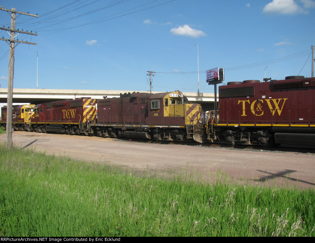 TC&W/RRV&W locos resting next to the Hopkins Depot