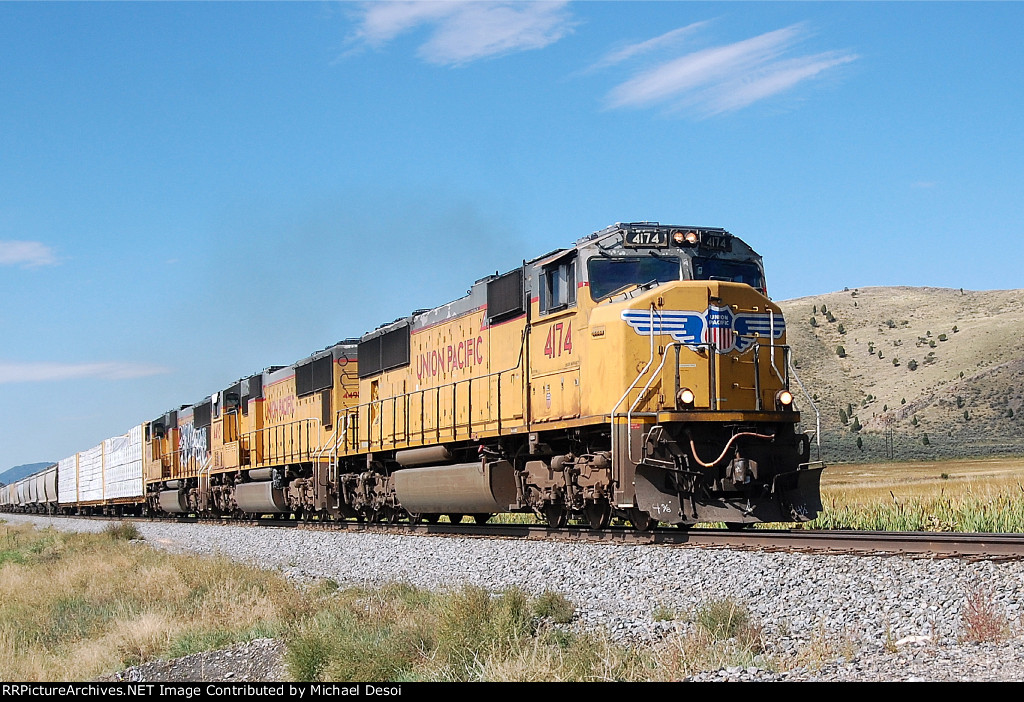 UP SD-70M #4174 leads 2 more SD-70M's on an eastbound freight just west of Soda Springs, ID. 9/7 ...