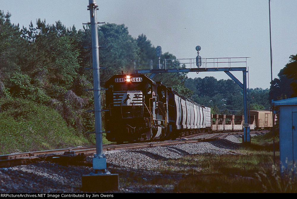Train #152 rolls north through CP Johnson.