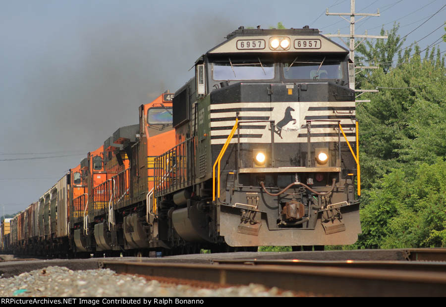 NS SD60E and BNSF partners lead westbound 11K into the afternoon sun