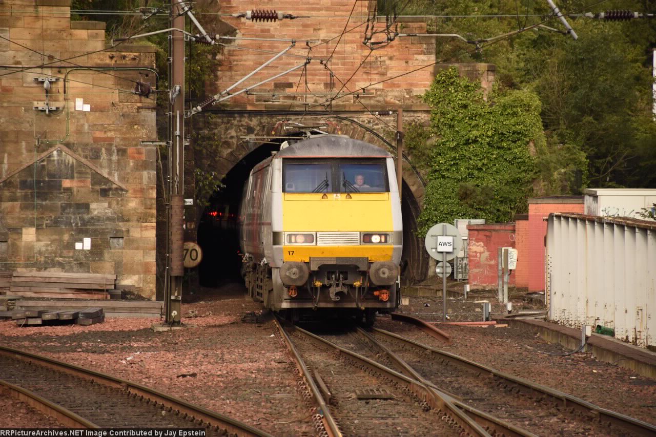 A Class 91 pops out of the tunnel