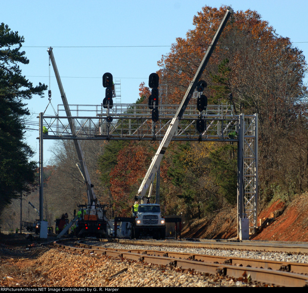 Cables attached to old signal bridge at Hurt. Sections obviously bolted together. I saw no sparks.