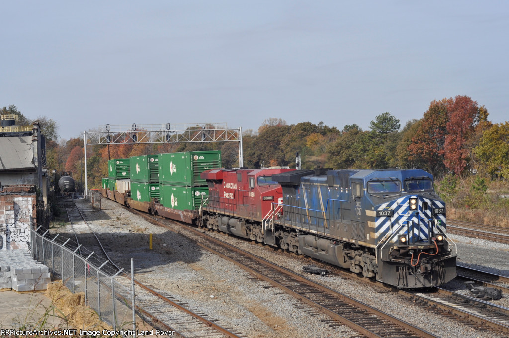 CEFX 1037 On NS 285 Eastbound With Five Hole Cars At Howell Jct