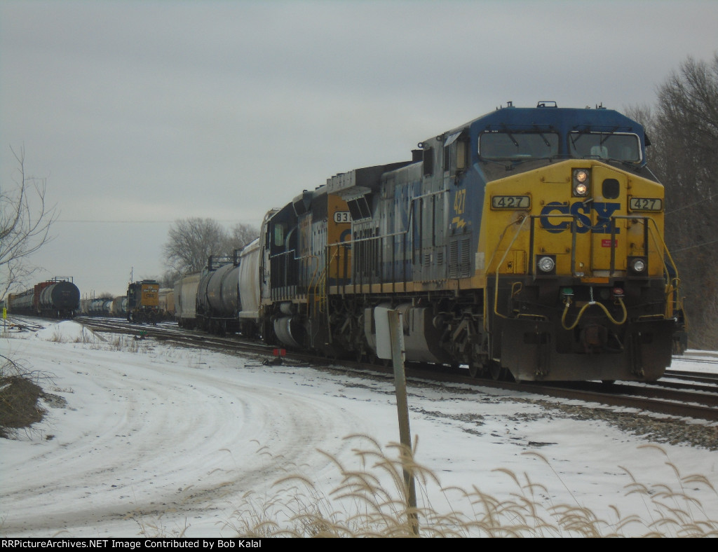 CSX 427 & 8388 move out of yard track onto Main Line