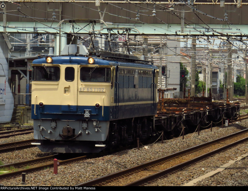 EF65-1102 with some rail transporters