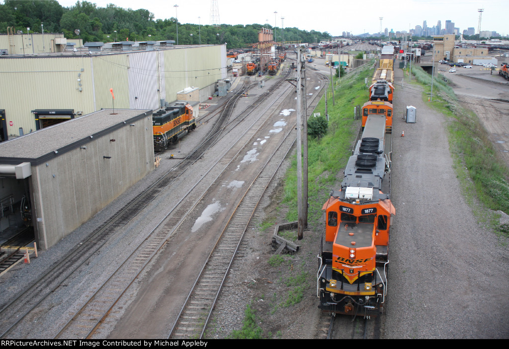 BNSF 1877 works the hump with two other units.
