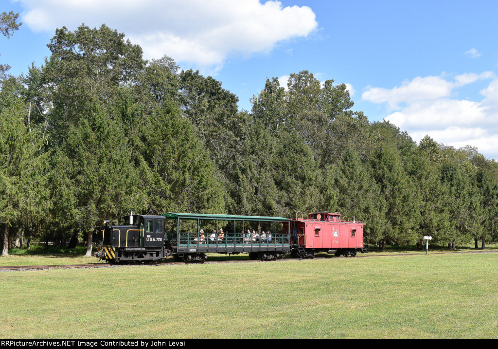 USAX Tonner # 7751 leading its train through the field of Allaire State Park.