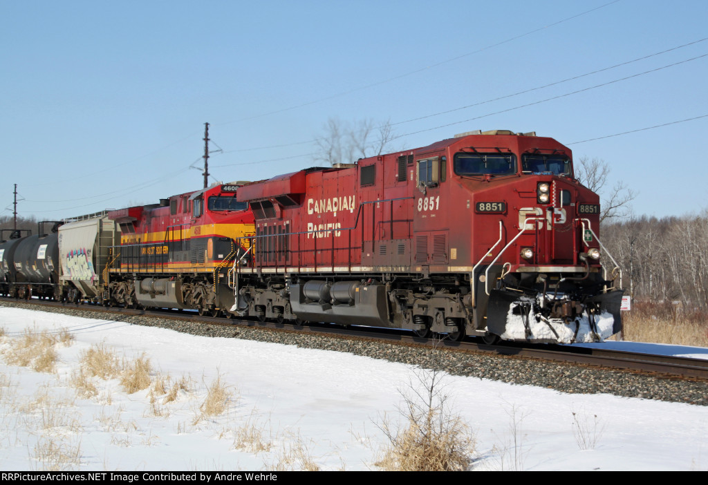 CP 8851 leads EB ethanol train 686 with a dirty Belle behind