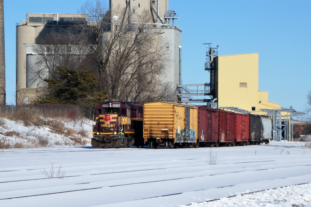 WC 3018 running around its train