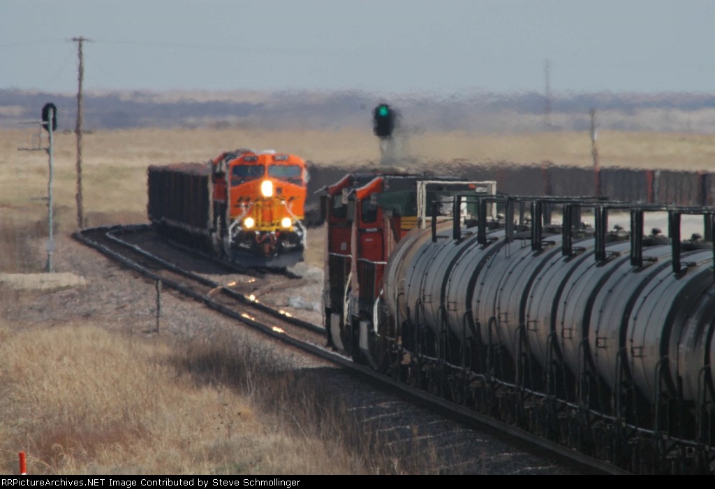 BNSF empty coal train meets eastbound molten sulfur train