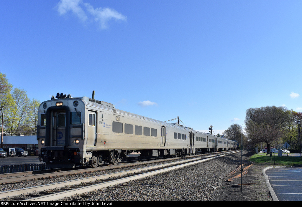 NJT Train # 54 with MNR Comet V Cab Car # 6700 leading on Main Line near Glen Rock Depot