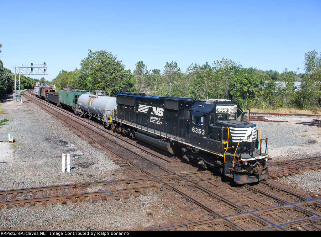 NS 6353 leads local L38 across the CSX (E-L) diamonds in town