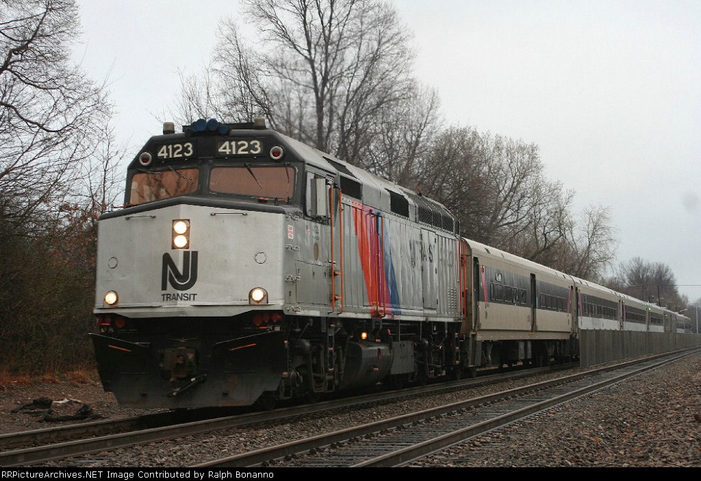 NJT F40 4123 departs from the Radburn station enroute to Suffern NY via the Bergen County Line