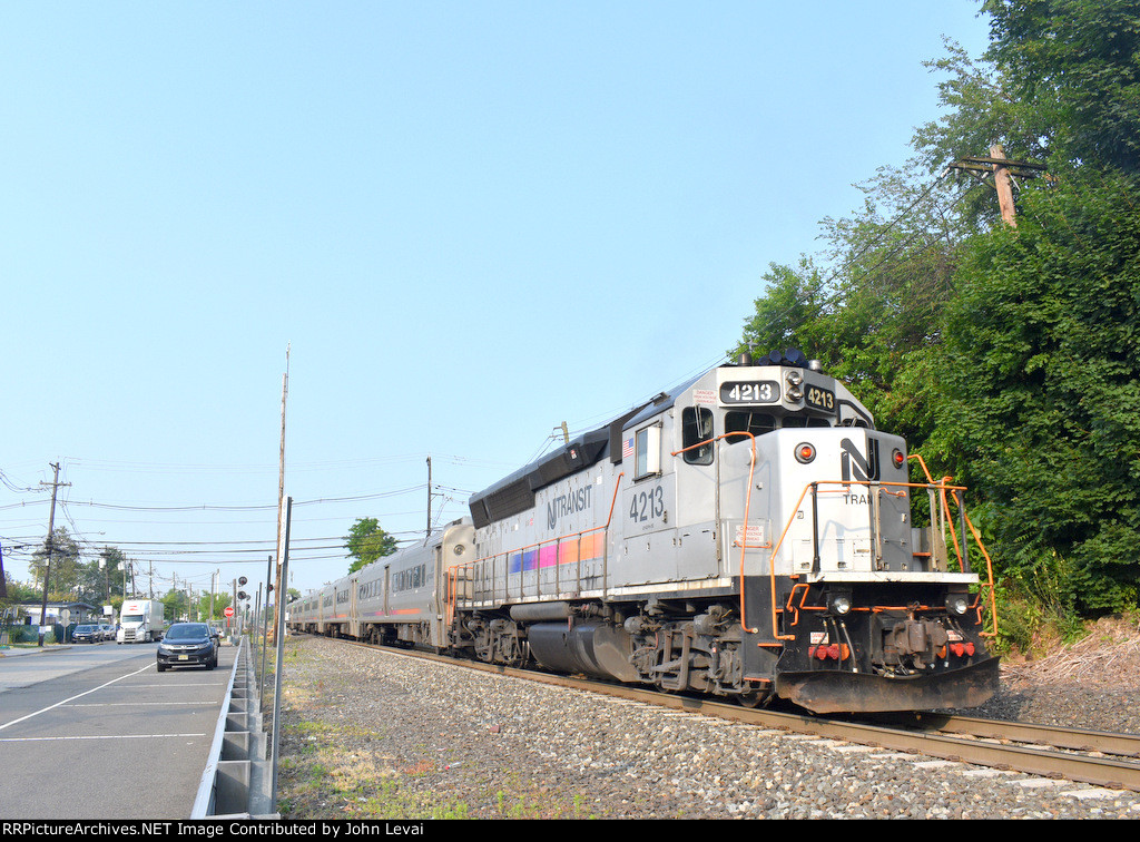 NJT GP40PH-2B # 4213 powers Train # 1610 toward Secaucus Jct and Hoboken after passing the depot