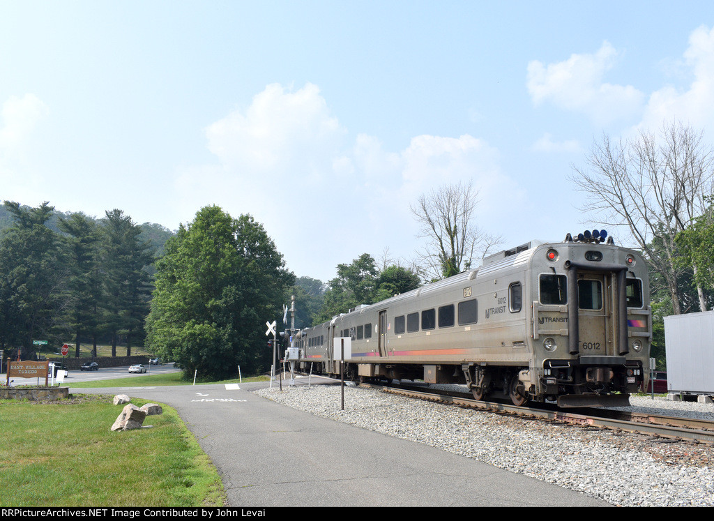 NJT Comet V Cab Car # 6012 trails on NJT Train # 49 after departing Tuxedo Station