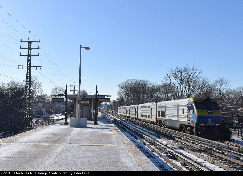 DE30AC # 408 pushing Train # 557