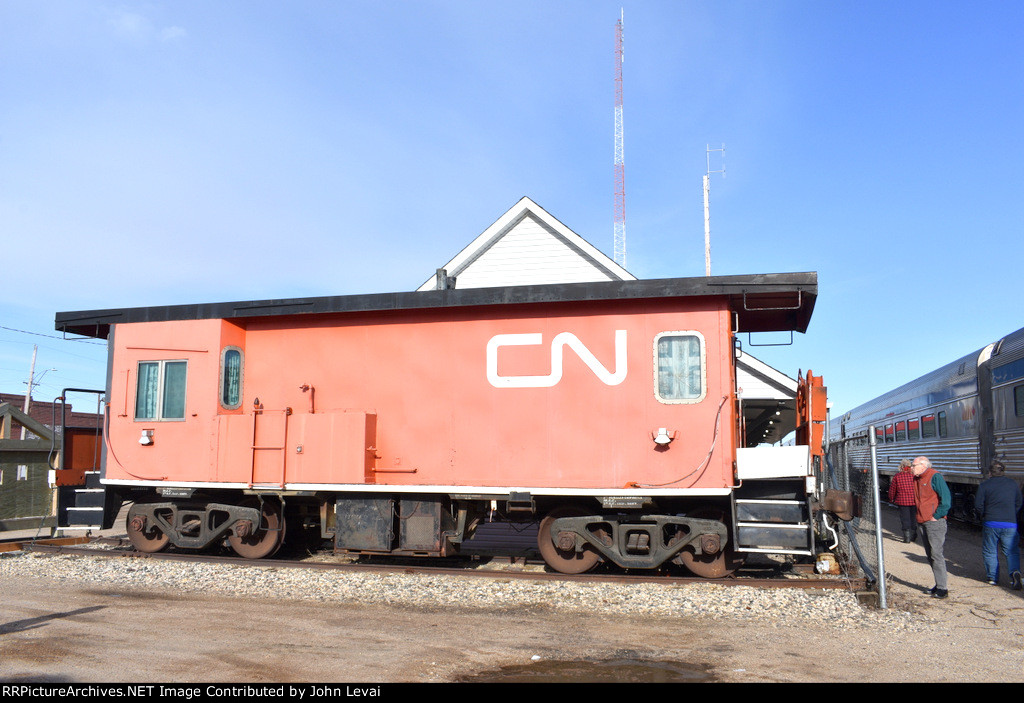 Restored CN Caboose next to the Canora Depot building