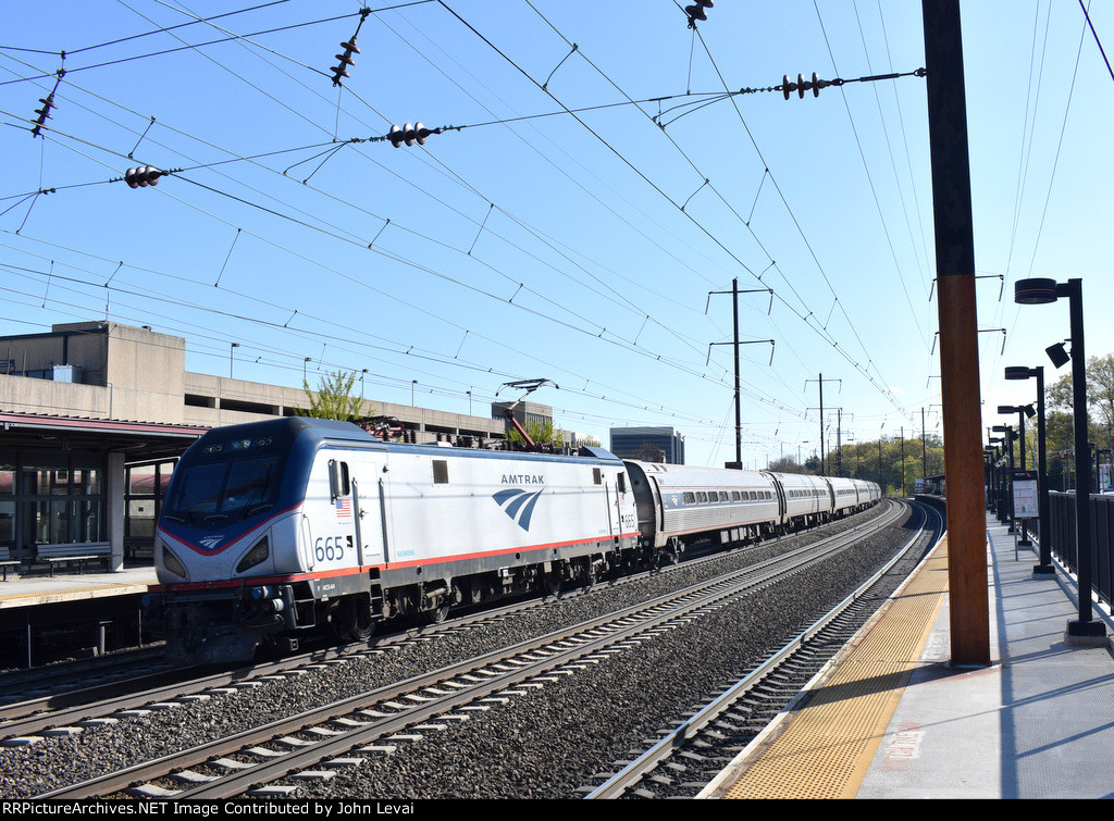 Amtrak Northeast Regional Train # 94 with Sprinter # 665 running on Track 2