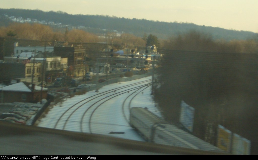 #1174 heads out of Suffern Yard, as seen from the NY State Thruway