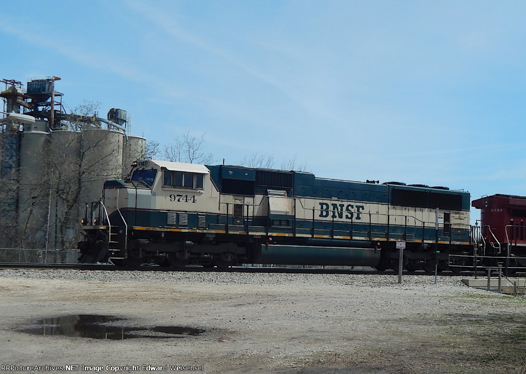 Executive leads a combined 58 with mid-train help