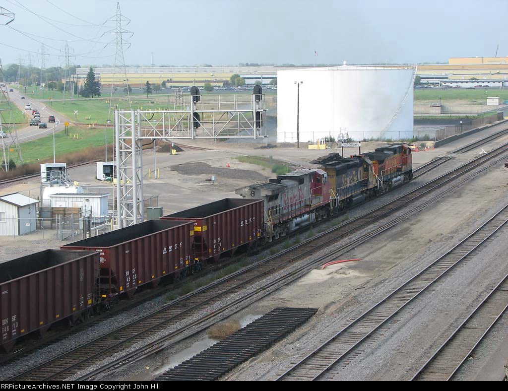 070924025 Northbound BNSF taconite ore empties at Northtown CTC 44th