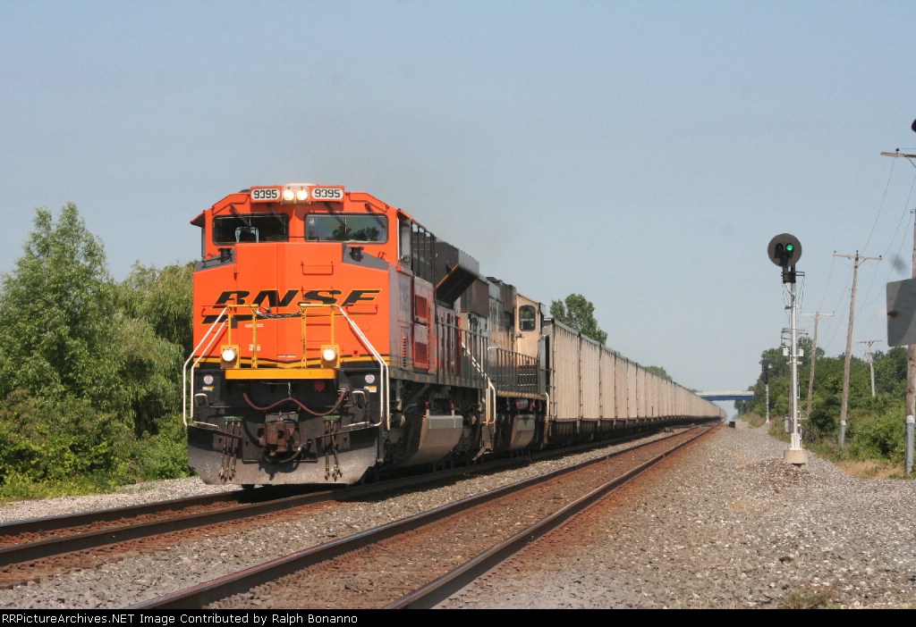 NS 416, with BNSF power passes eastbound through CP 234 in morning sun