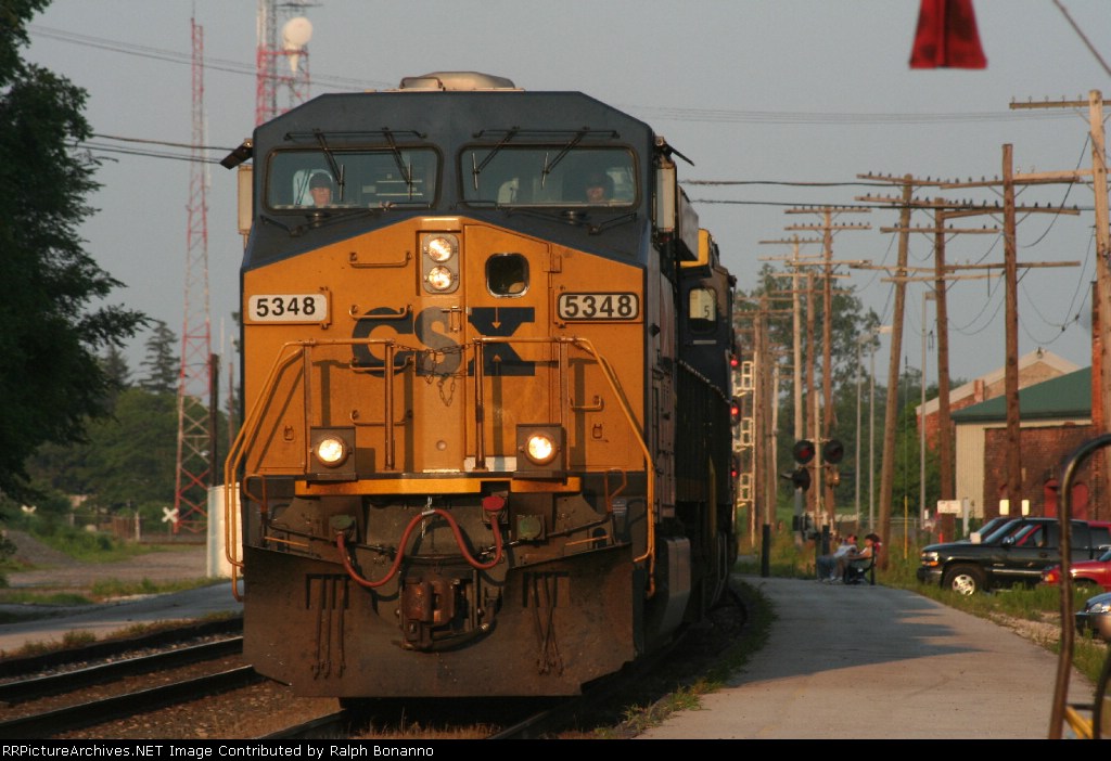 Q117, from Boston, rolls past the station westbound on track 2