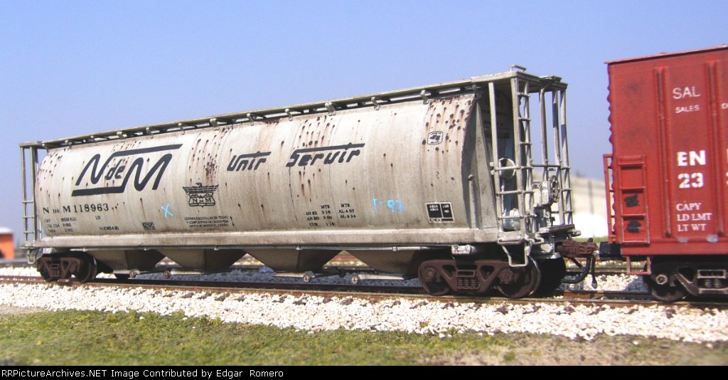 NM 118963. Custom painted and weathered Intermountain cylindrical covered hopper, as used by the ...