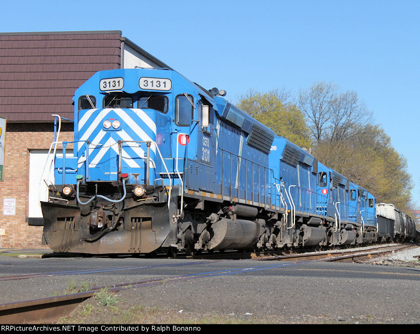 NYS&W train SU-99 with a quartet of CEFX "Bluebirdfs" crosses River Rd enroute to binghamton NY