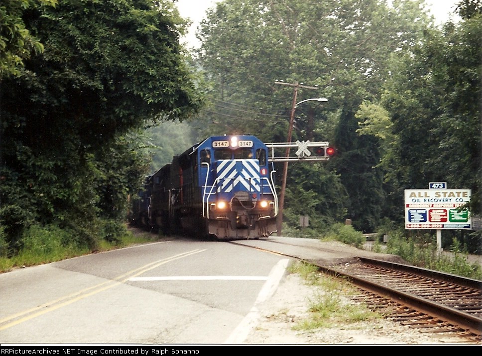 SU-99 with "borrowed CEFX 3147 assaults the Spart Mountain grade at the Smith Mills crossing