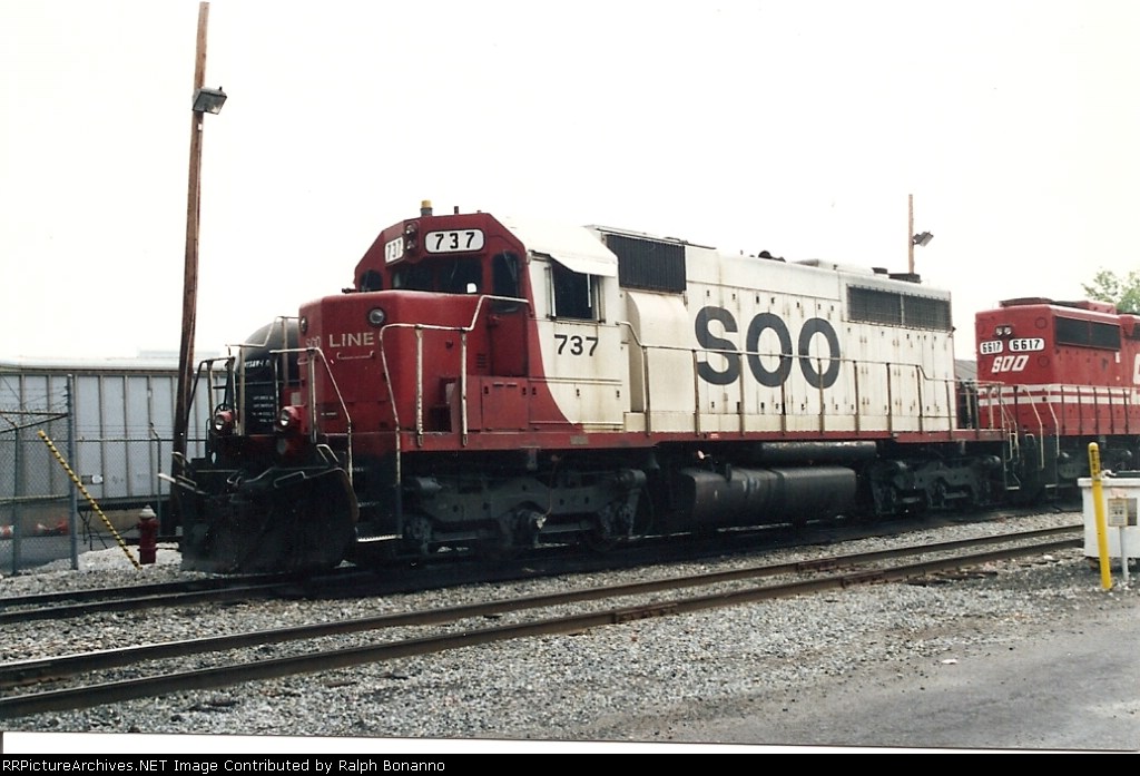 Two SOO SD40's, two paint schemes, with and without dynamics. on the fuel track