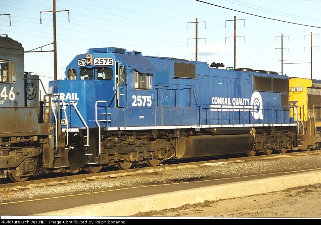 In the comapny of a CR C40-8 and a CSX C30-7, SD70 2575 waits on the inbound service track