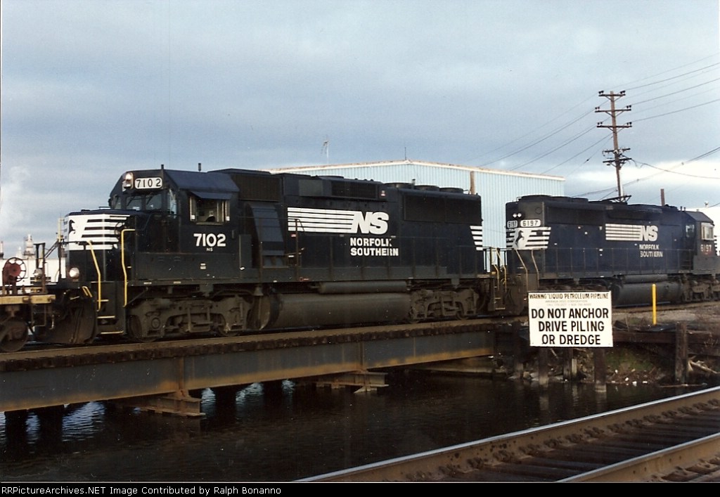 GP60 7102 crosses the Overpeck Creek bridge while making a yard move