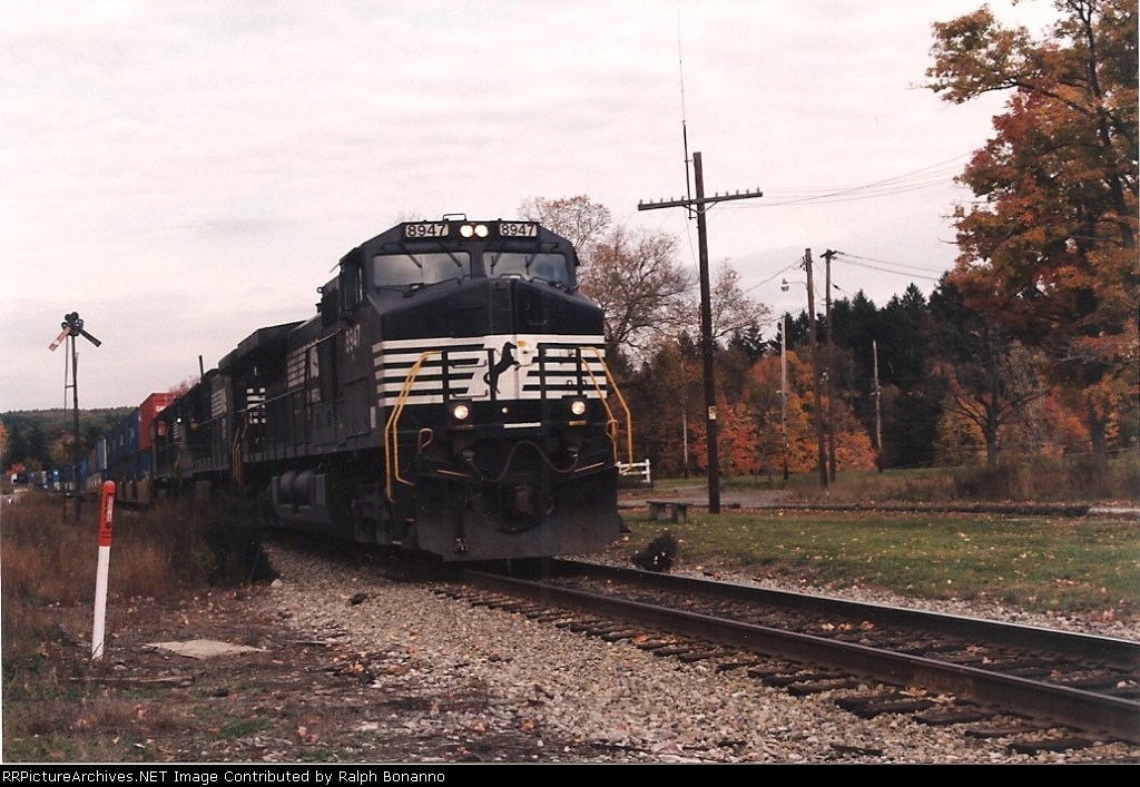 Train 252, led by NS 8947 rolls east past the old Morris County Central RR site