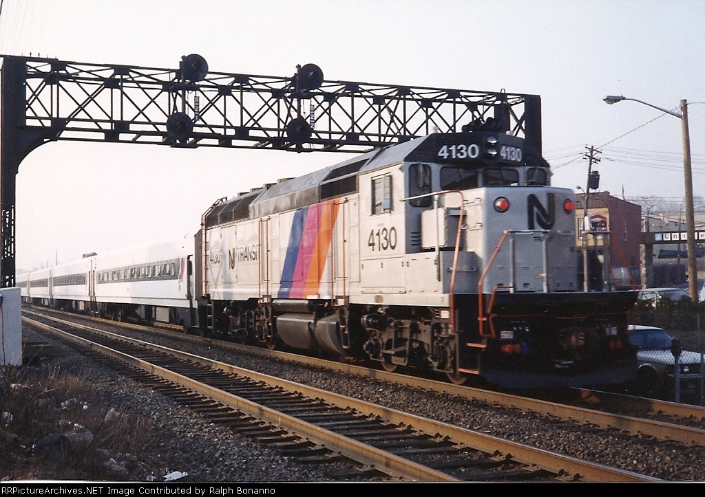 NJT 4130 oushes an eastbound into the station, Hoboken-bound