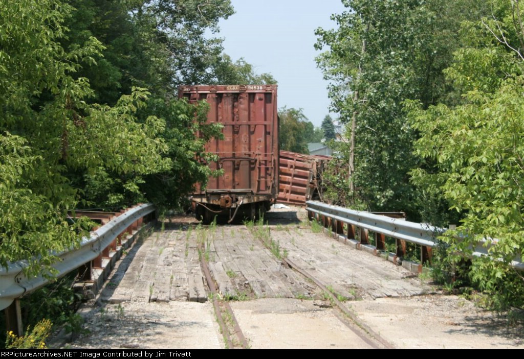 Damaged cars sitting on the lead to Miller Mining