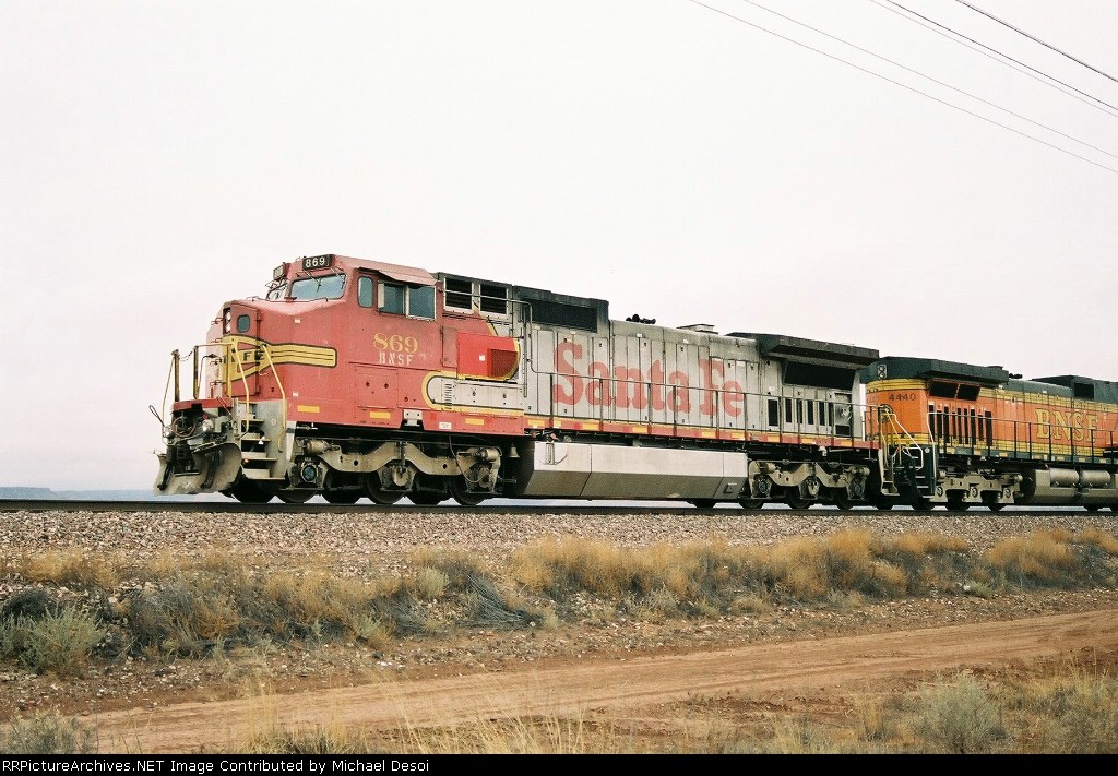 BNSF C40-8W #869 leads an eastbound just west of Rio Puerco