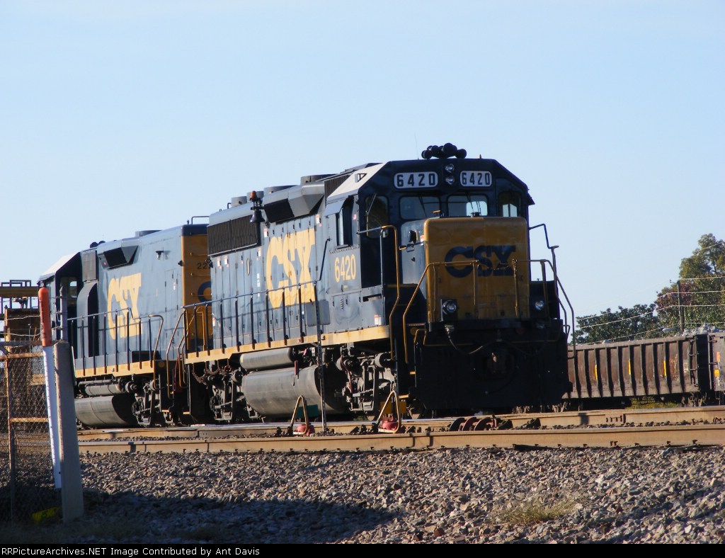 CSX 6420 lead power on a rail train sitting in the yard