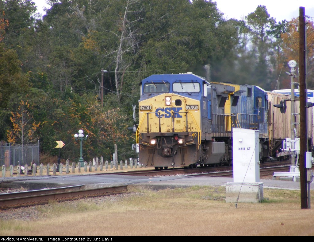 CSX 7801 brings a Mixed Train into town