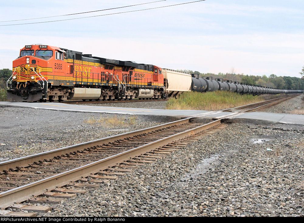 Westbound empty ethanol train K689-29 crosses Stone Rd on its journey west