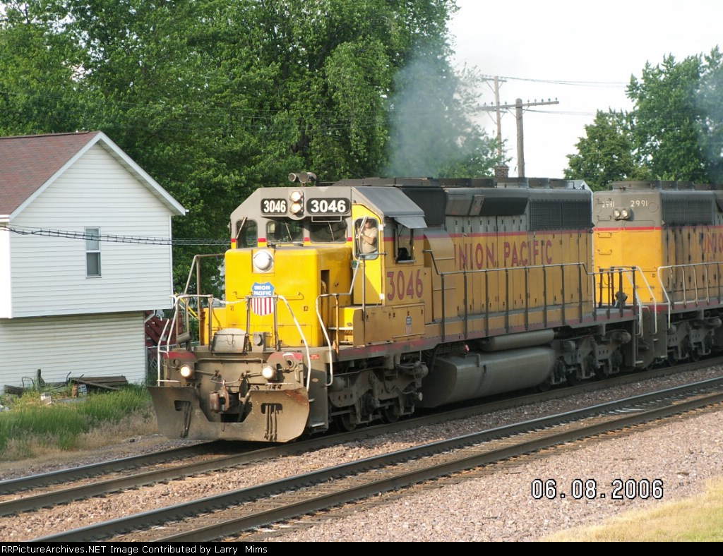 Ex CNW SD40 leads Westbound Thru Rochelle