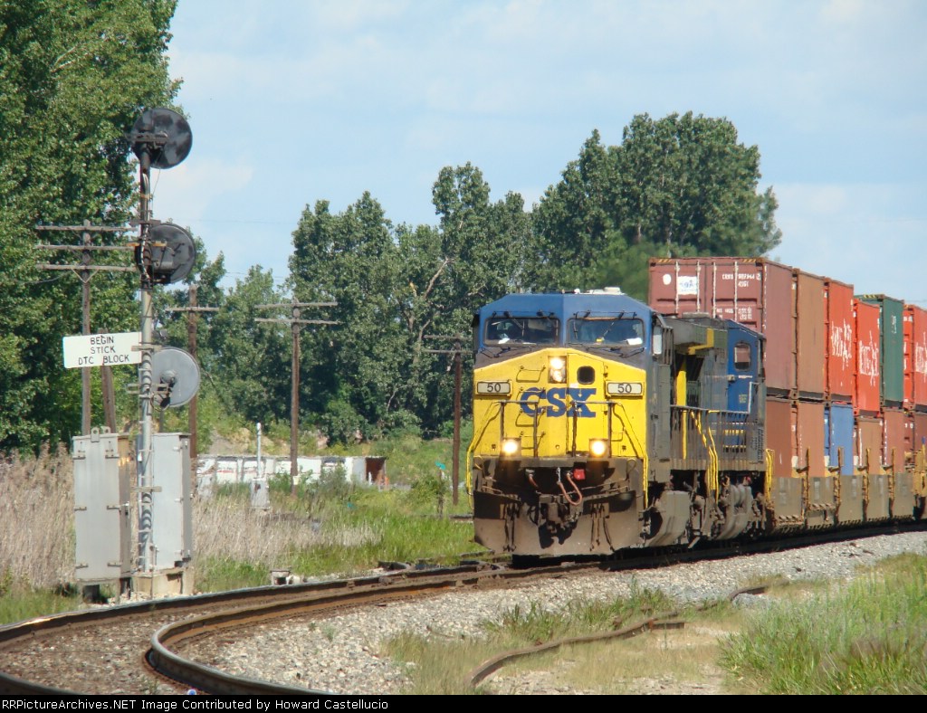 CSX #50 about to take the SB home signal at Hallett tower. Im standing next to the TT main wich ...