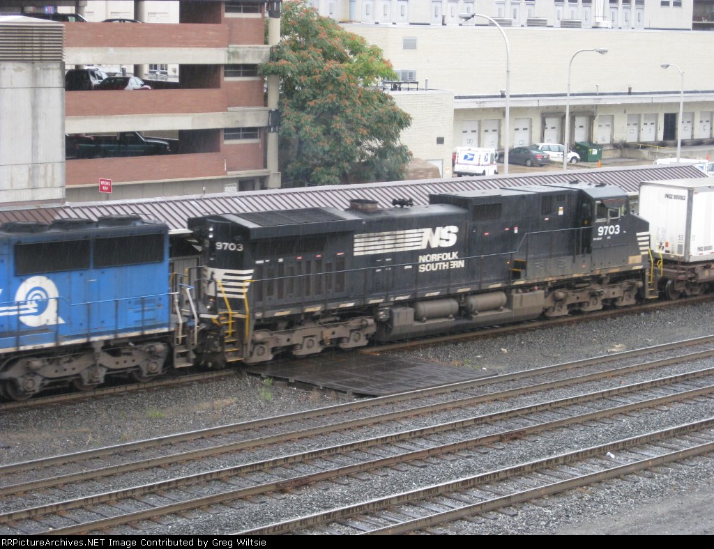 NS 9703