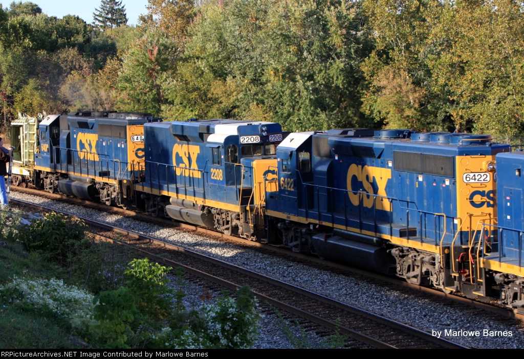 CSX 6422 and 6400 bracket an ex-GP30 road slug on the W032-08