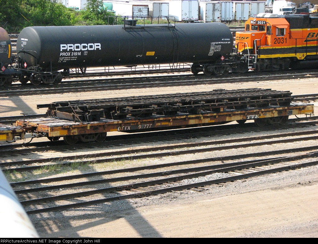 090831029 OTTX 97777 at BNSF Northtown "T" Yard with used hump "Retarder" section