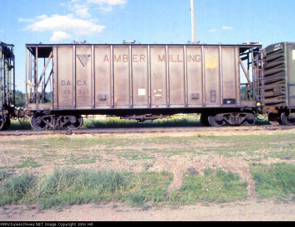 1181-20 AMBER MILLING GACX 45331 on westbound BN freight