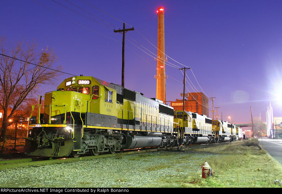 SD60 3800 and 3 others await departure as SU-99 at Cross St