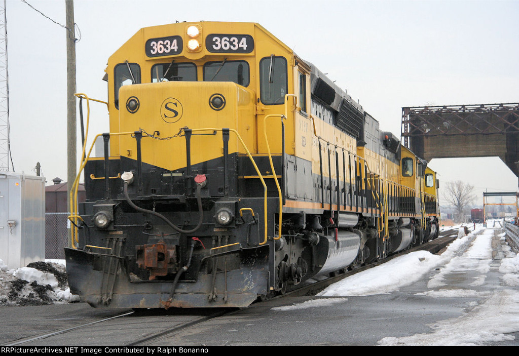 Ex-BN SD45(-2 upgraded) 3634 reverses to tie on to the freight in the background