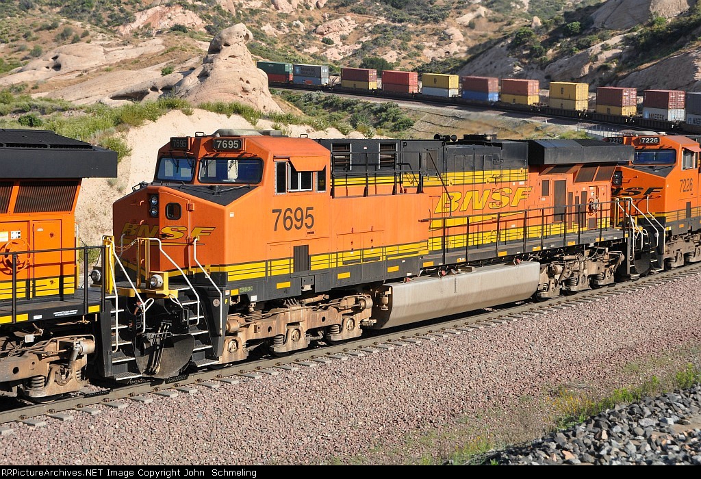 BNSF 7695 (ES44DC) Yellow Power Bar at Blue Cut CA. 6/19/2010